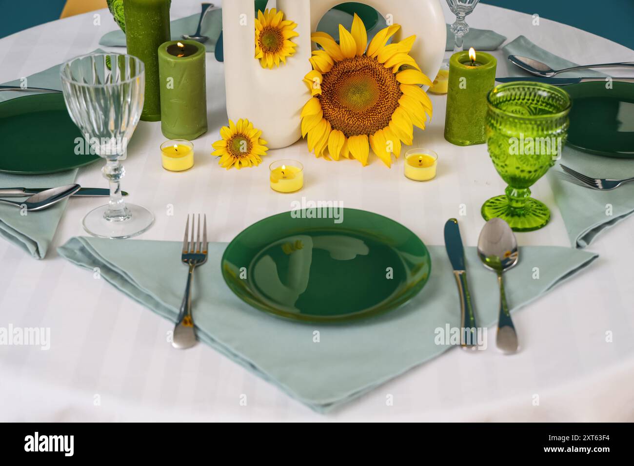 Modern table setting with sunflowers Stock Photo - Alamy