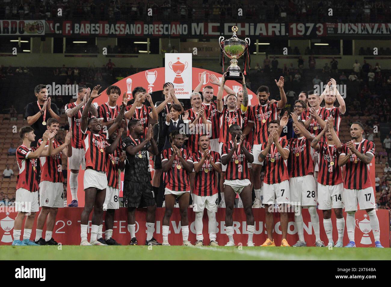 AC Milan players celebrate with the trophy after defeating Monza in the ...