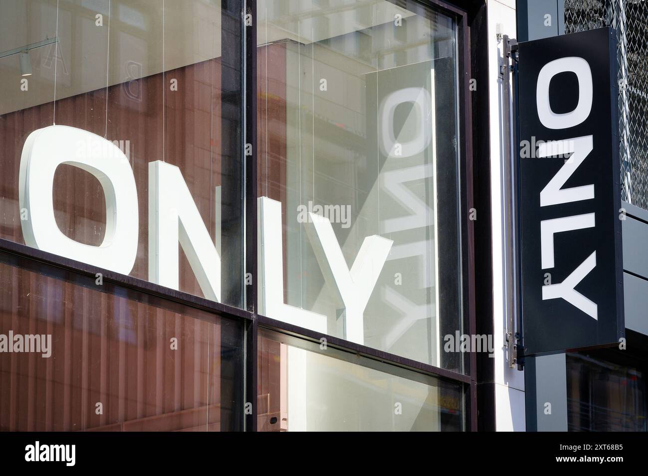 Cologne, Germany, August 12, 2024: Only store advertising sign on the ...