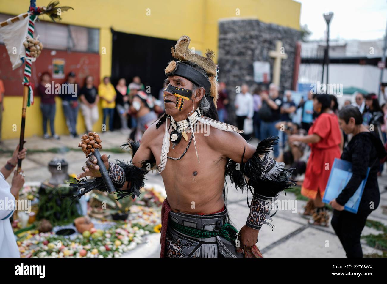 Mexica dancers perform during a ceremony marking the 503rd anniversary of the fall of the Aztec ...