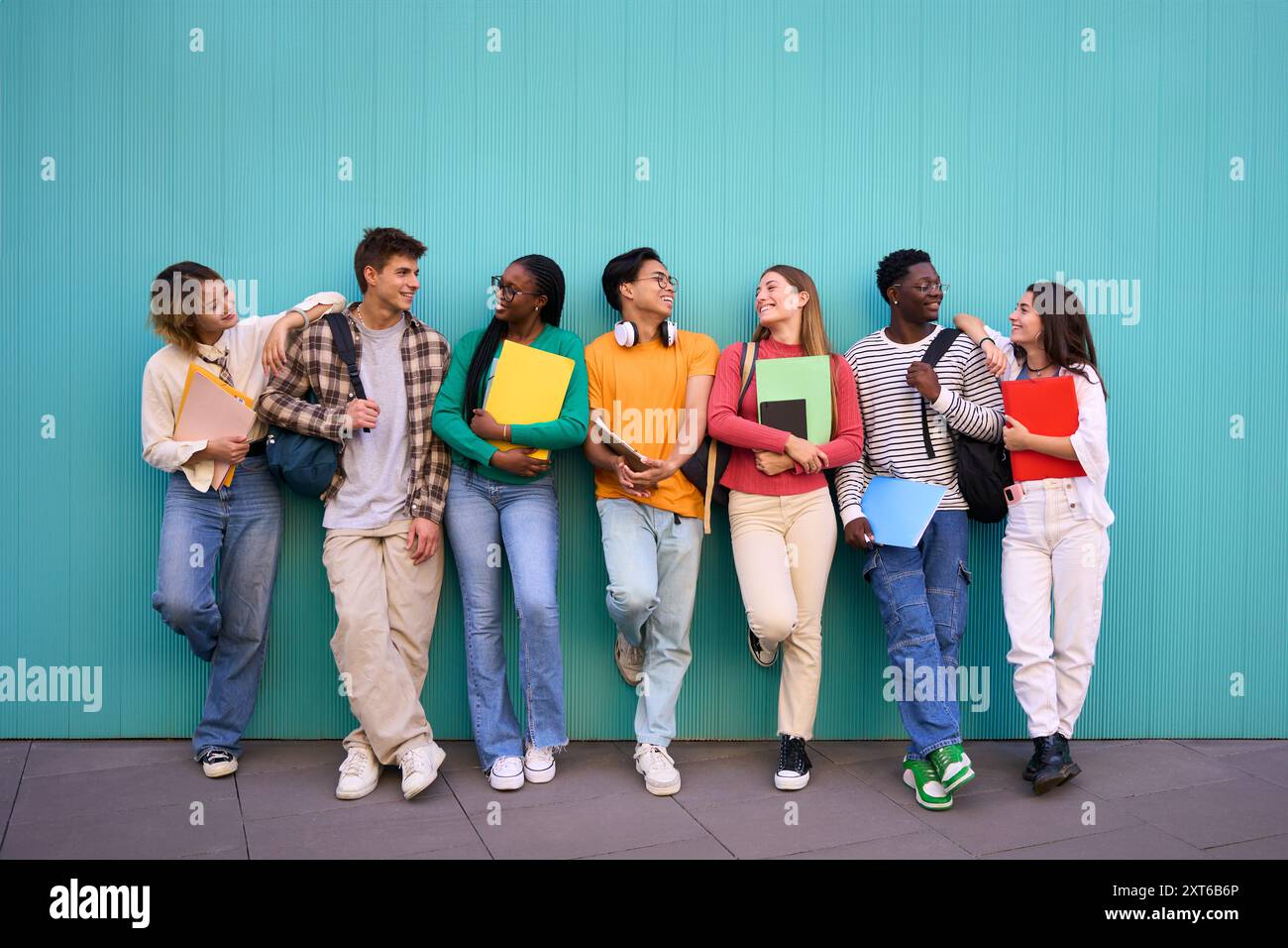 Joyful large group generation z diverse students looking smiling other ...