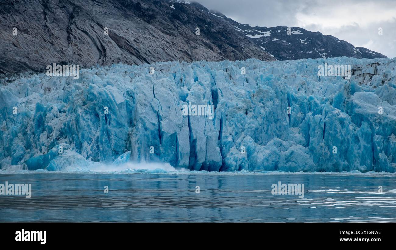 Edge of Dawes Glacier just beginning the calving process Stock Photo ...