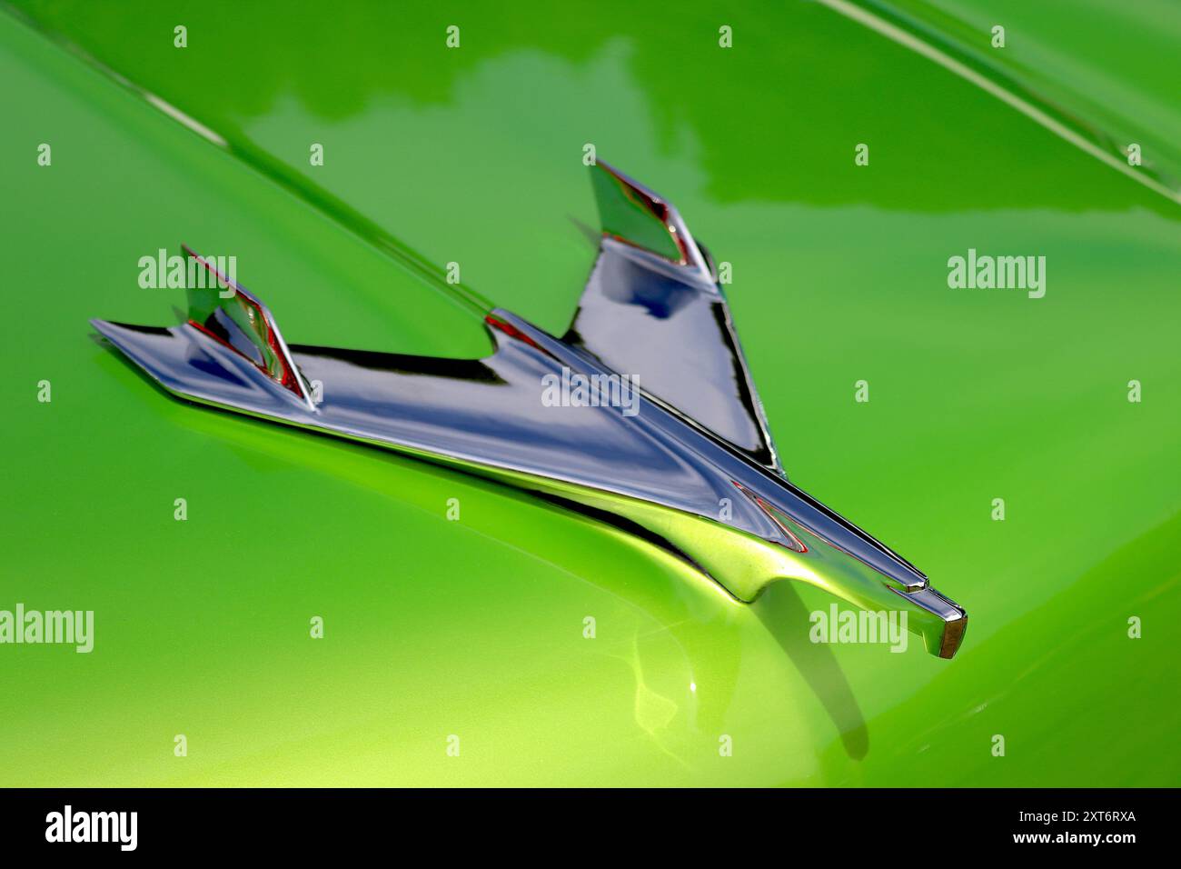 This chrome hood ornament (bonnet mascot) being likened to a cross ...