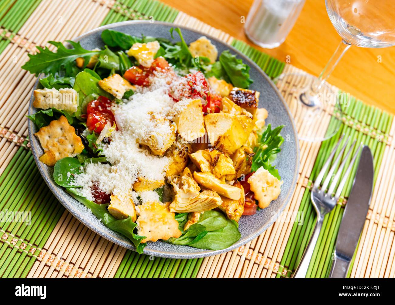 Caesar salad with chicken and parmesan cheese Stock Photo - Alamy