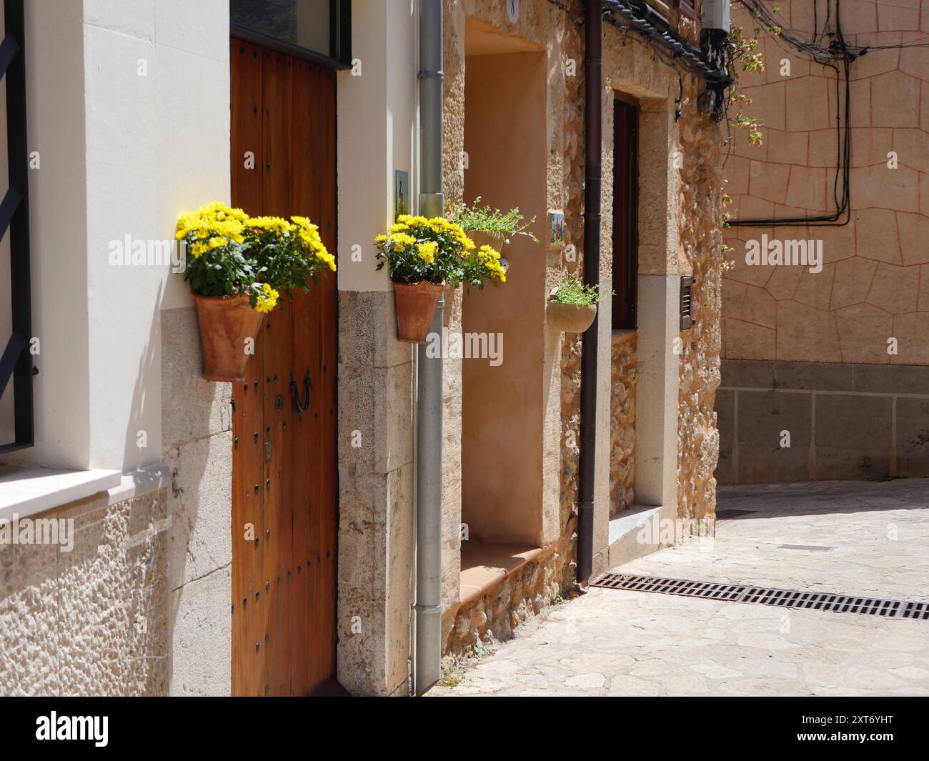 Street of the famous old mediterranean village of Majorca with ...
