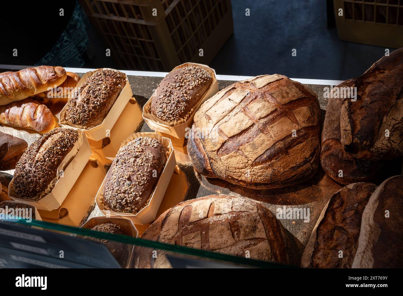 French artisan bakery in Bordeaux, fresh baked rye and wheat bread and ...