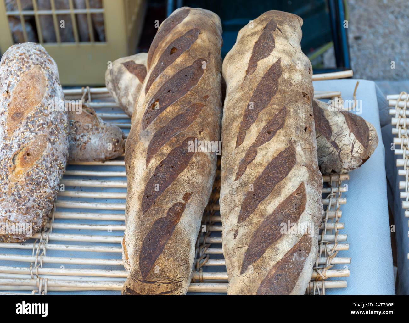 French artisan bakery in Bordeaux, fresh baked rye and wheat bread and ...