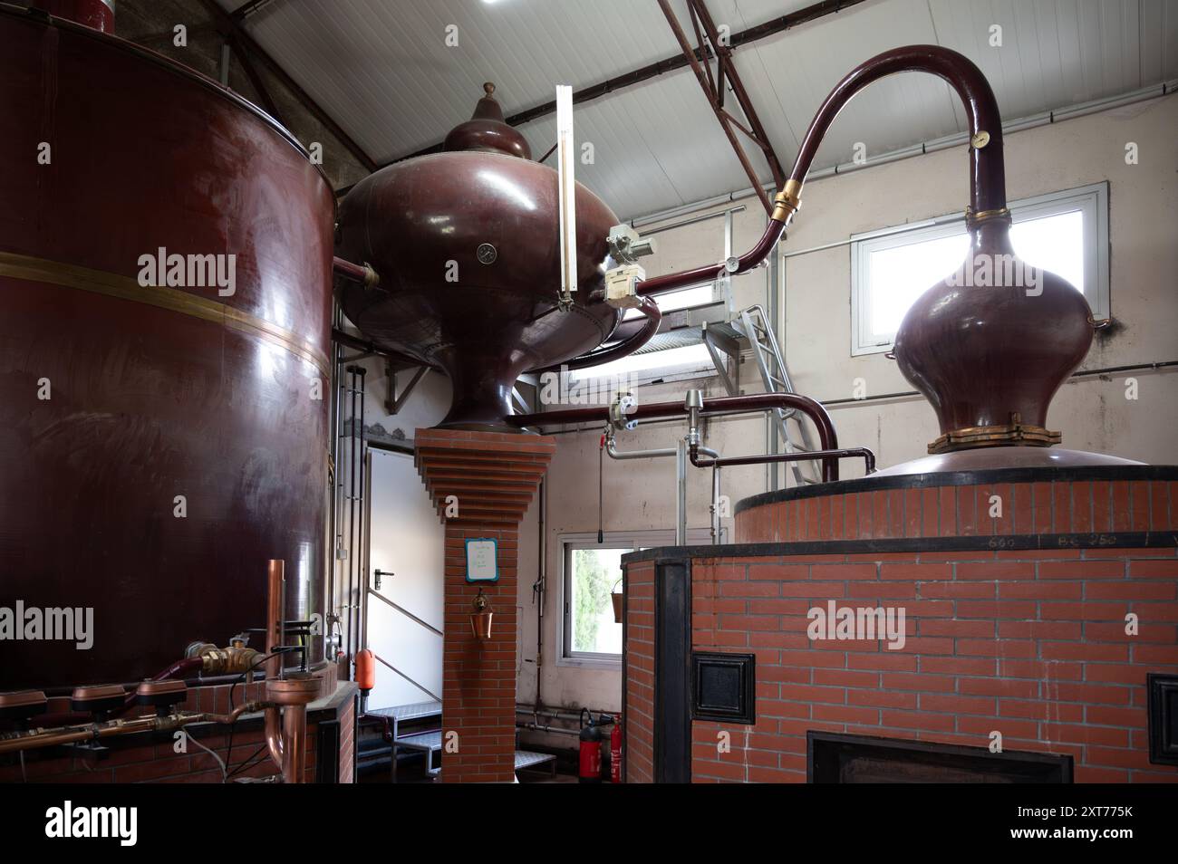 Double distillation process of cognac spirits in Charentias copper ...