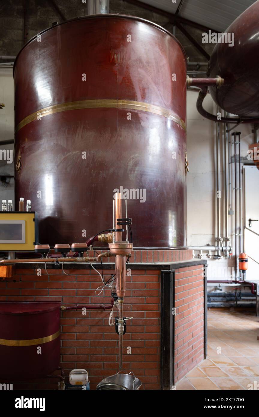 Double distillation process of cognac spirits in Charentias copper ...
