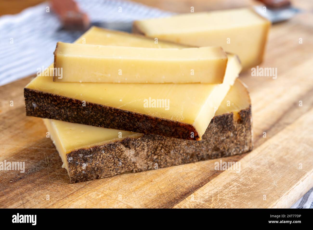 French aged in caves cheese Comte with brown rind, made from ...