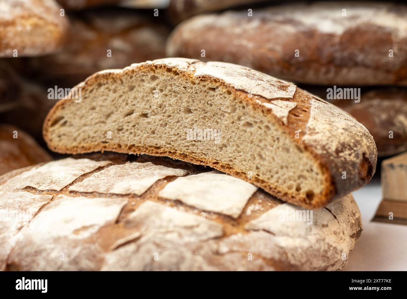 French artisan bakery in Bordeaux, fresh baked rye and wheat bread and ...