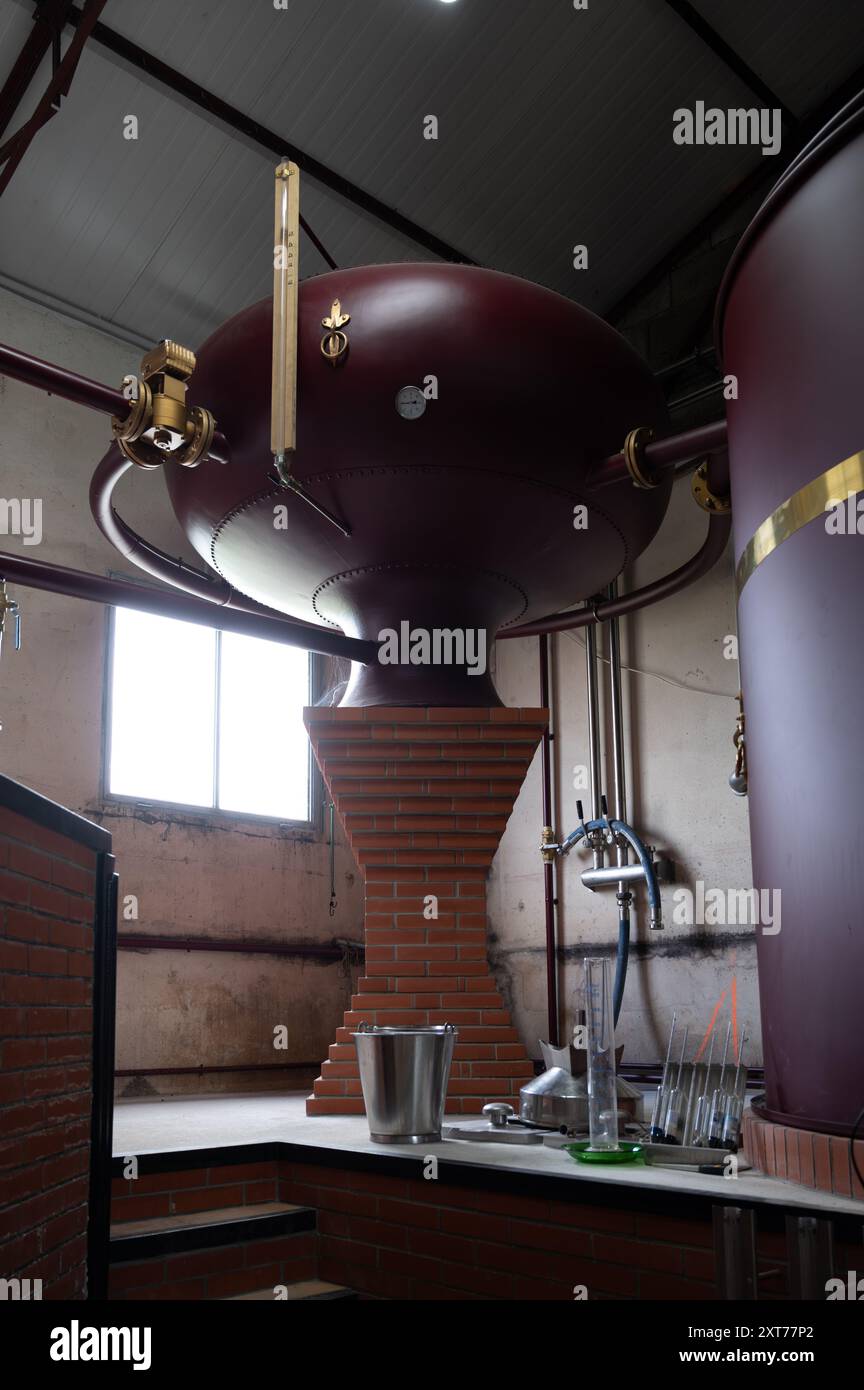 Double distillation process of cognac spirits in Charentias copper ...