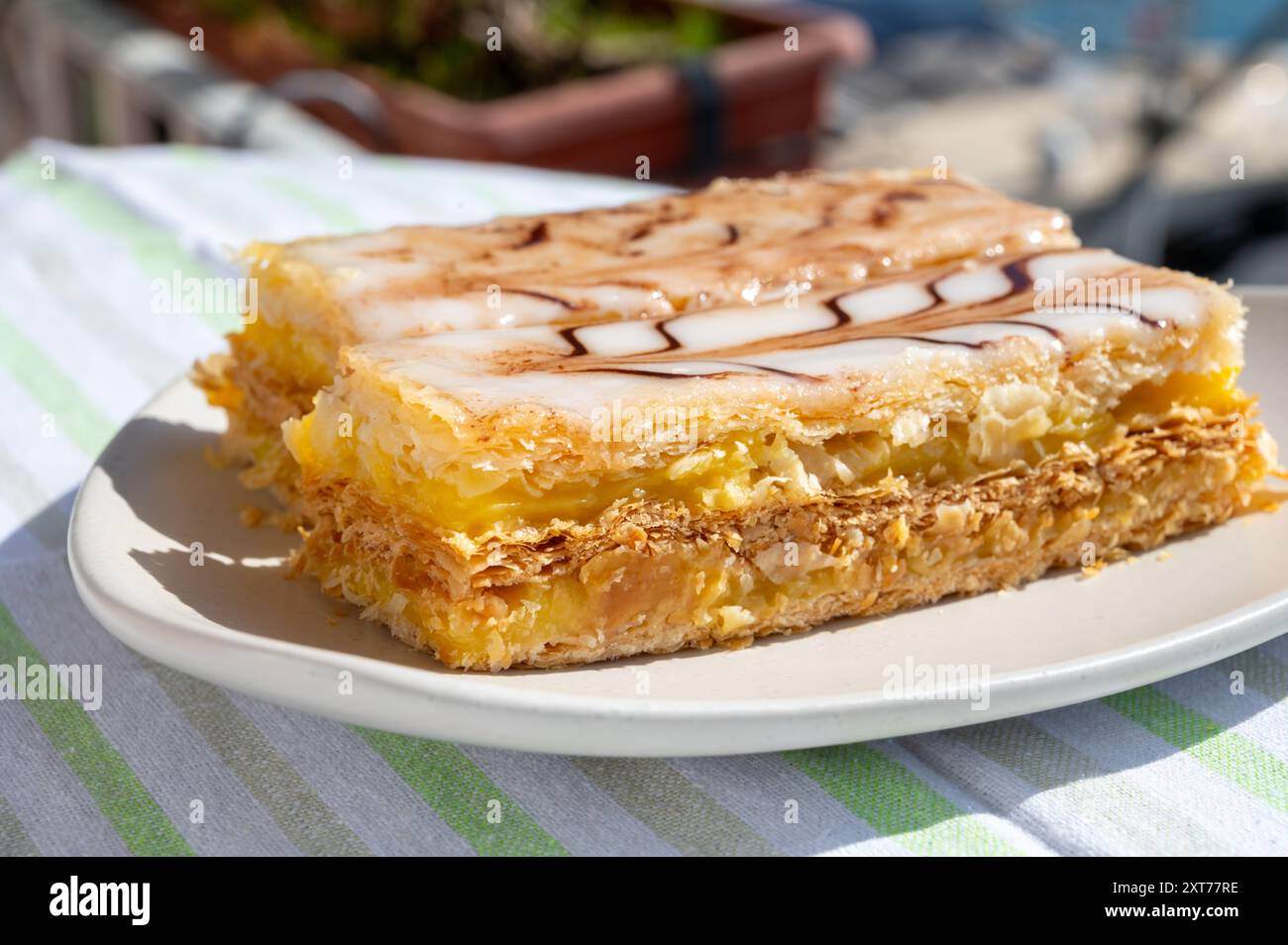 Portion of french mille-feuille cake, vanilla or custard slice ...