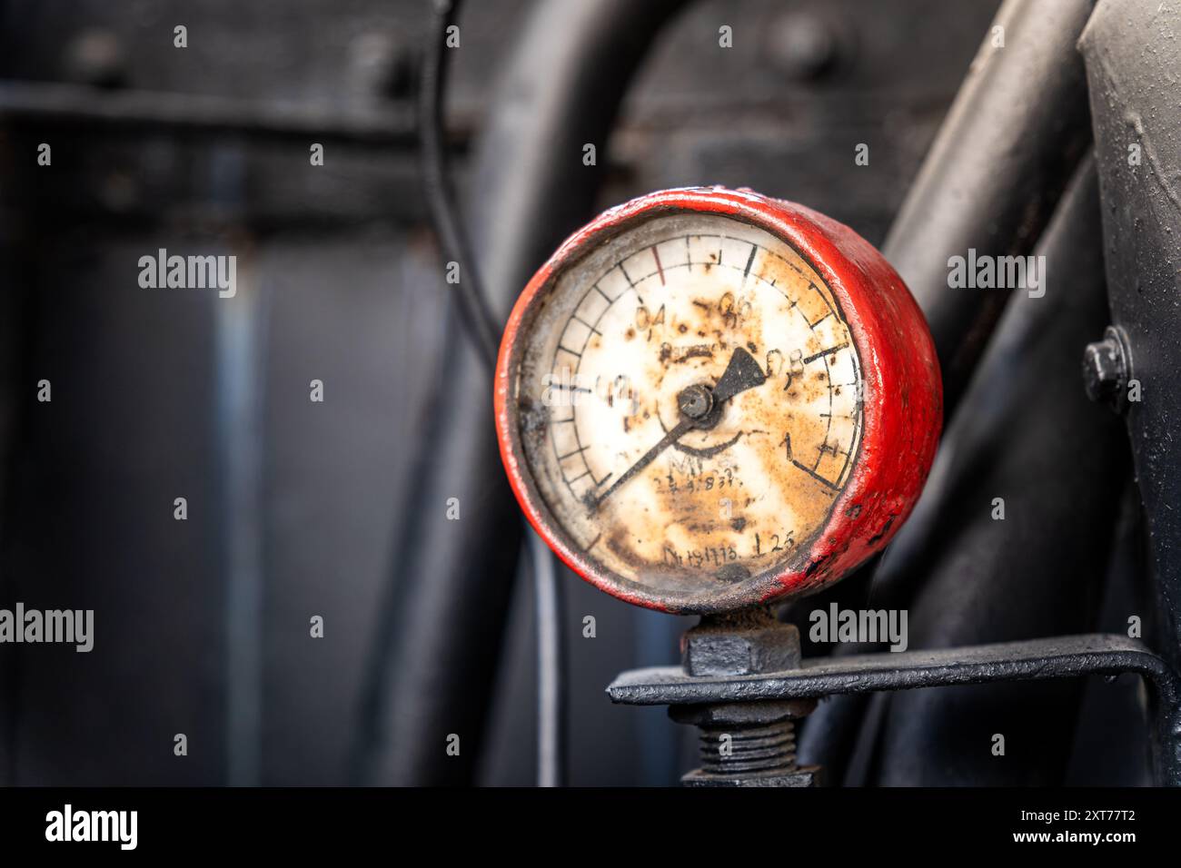 Valves and pressure gauge of a steam locomotive in a vintage railway ...