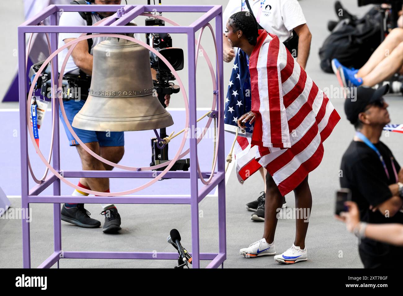 Masai Russell of United States of America rings the bell after ...