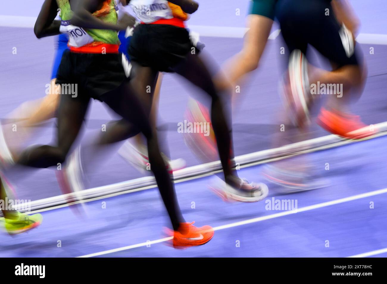 Atheltes compete in the men's 5000m final during the Paris 2024 Olympic ...