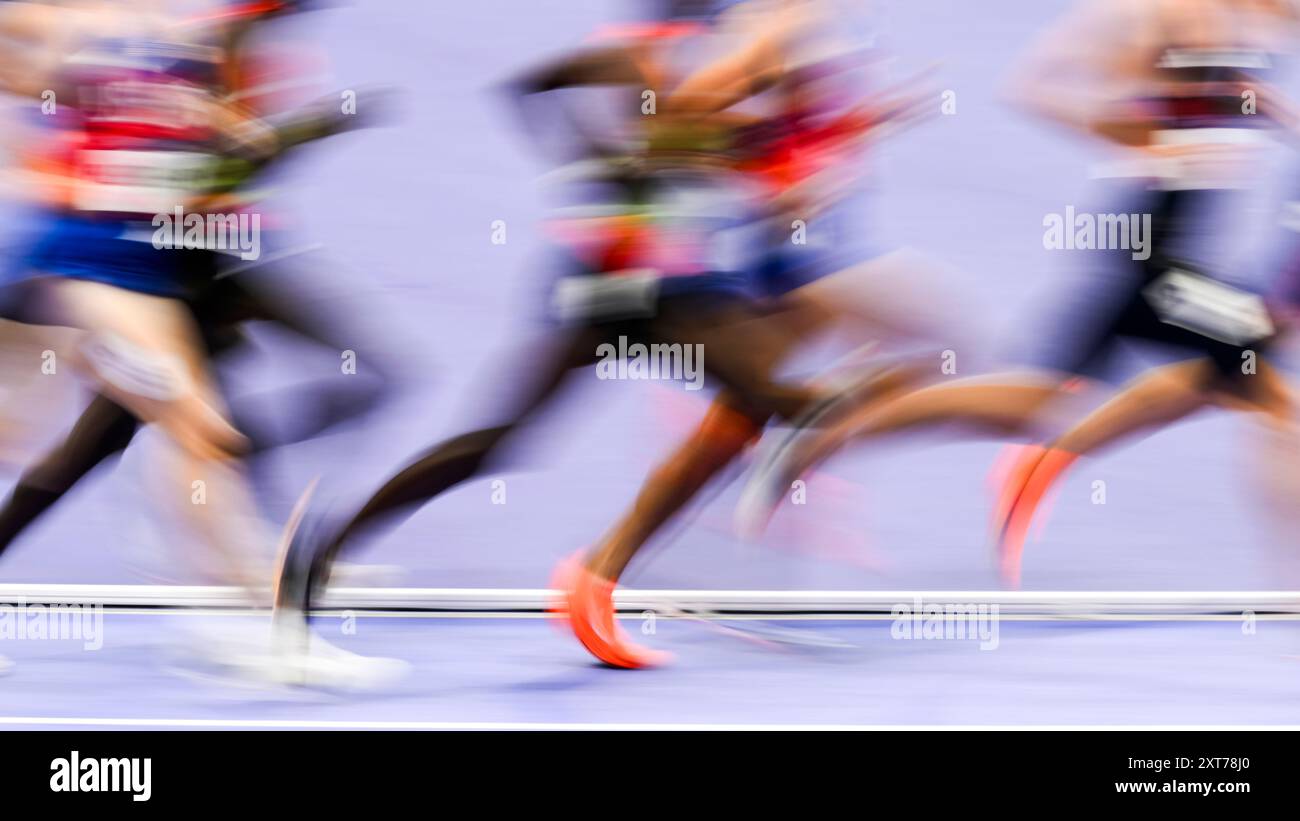Atheltes compete in the men's 5000m final during the Paris 2024 Olympic ...