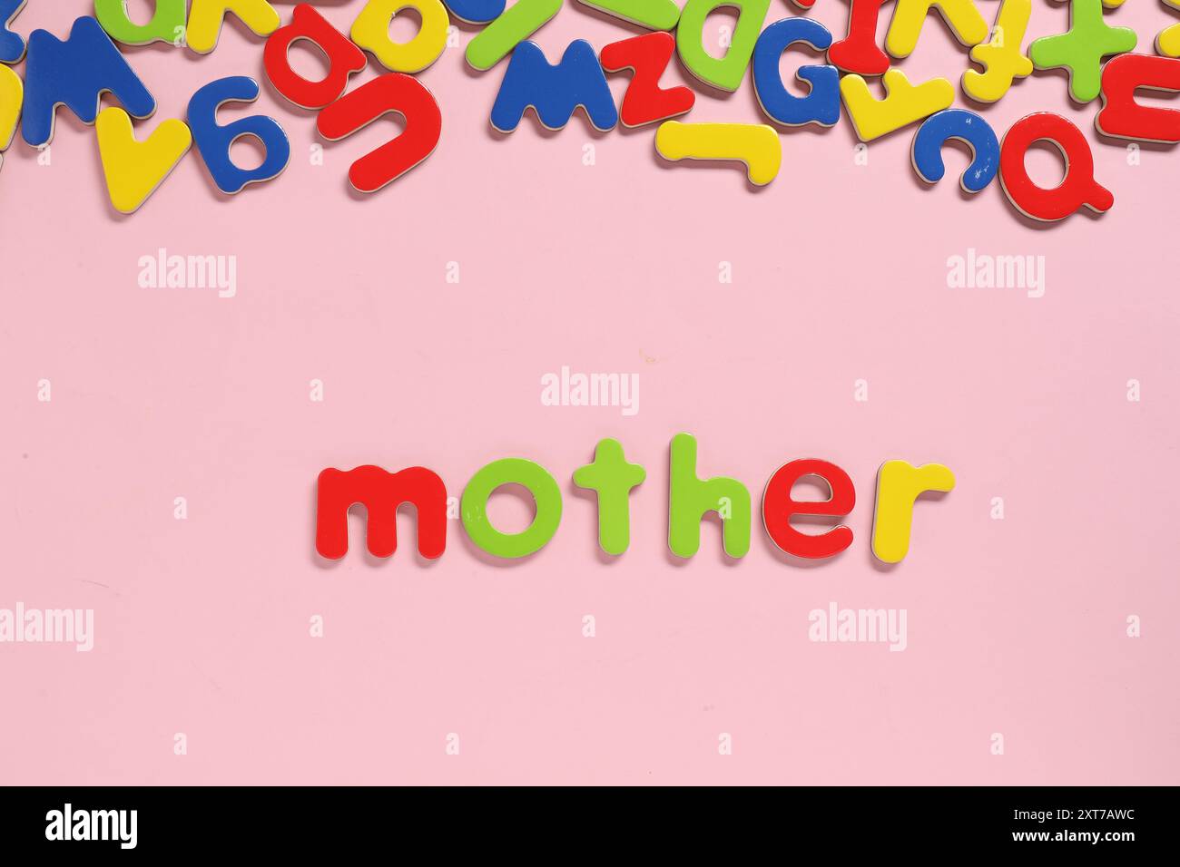 Word Mother made of magnetic letters on pink background, flat lay ...