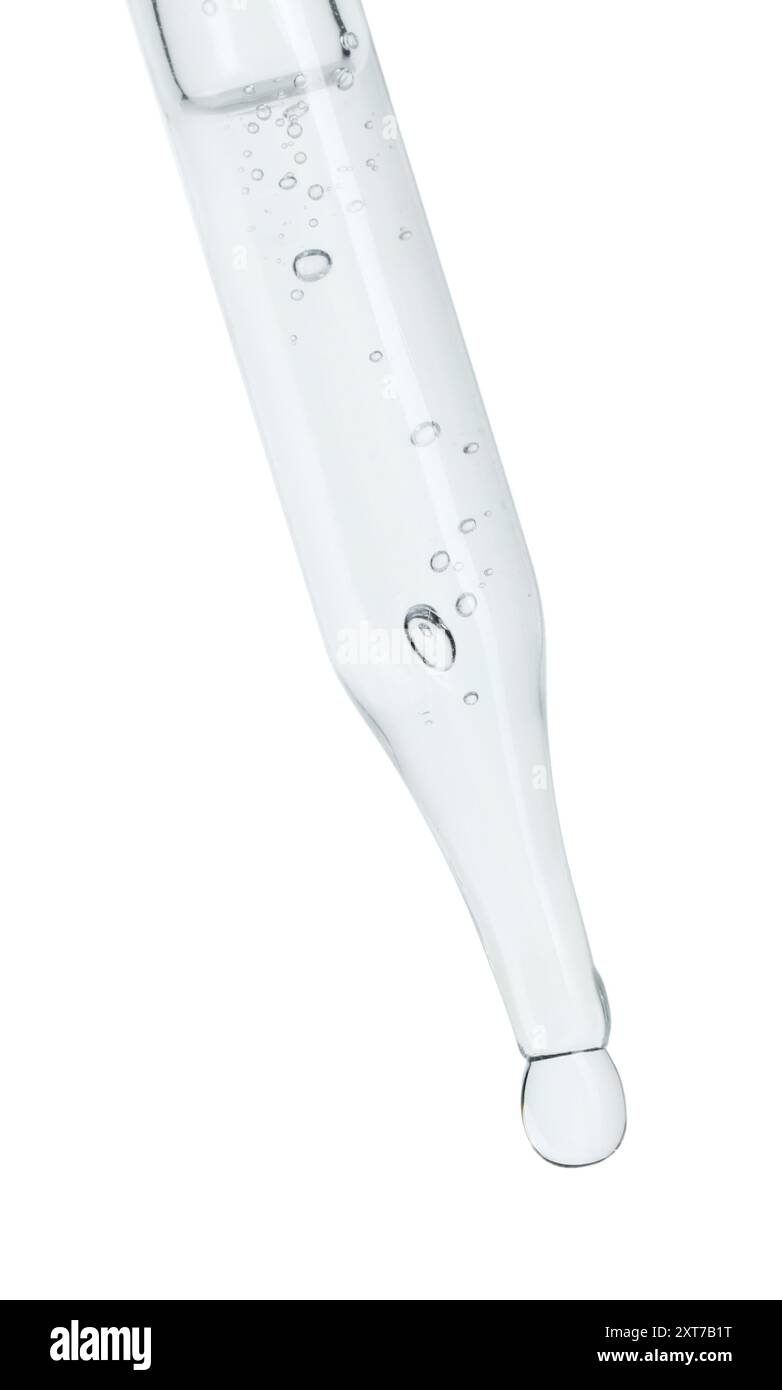 Dripping cosmetic serum from pipette on white background Stock Photo ...