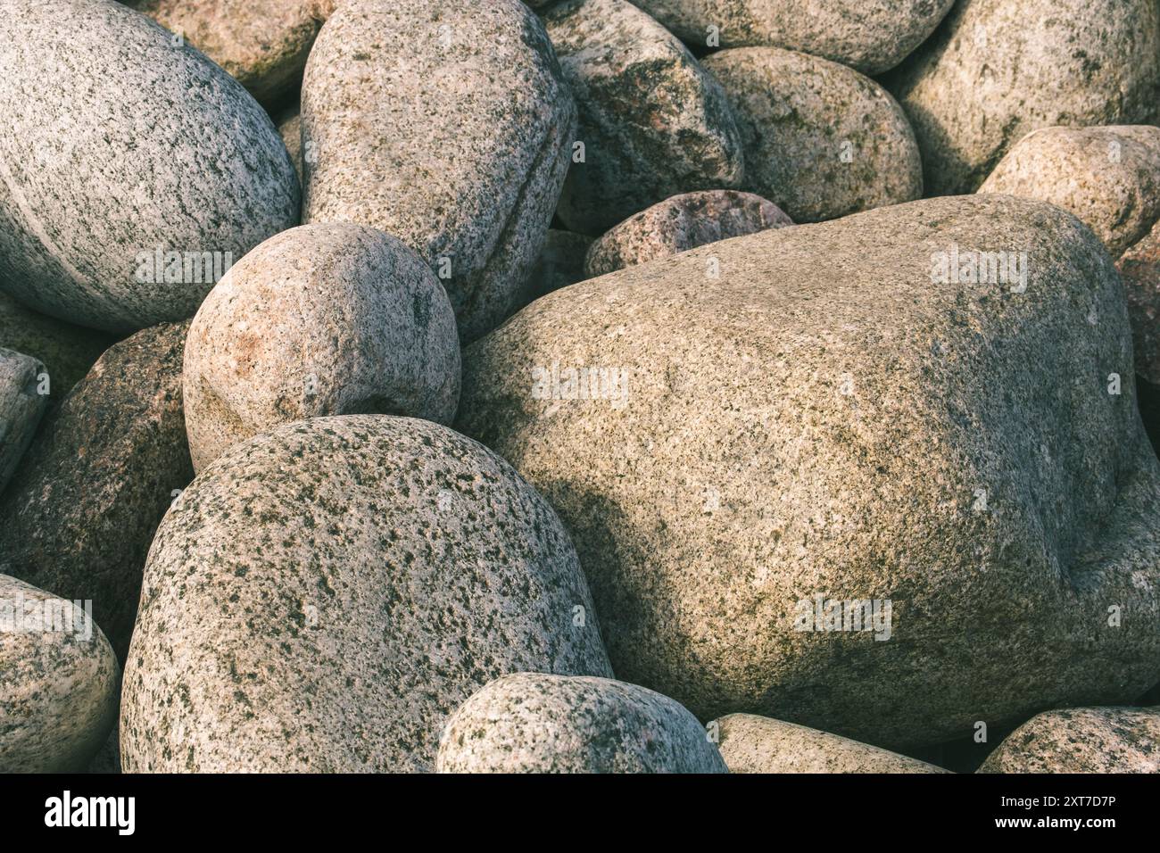 Textured Granite Boulders in Natural Light for Serene Landscaping Stock ...