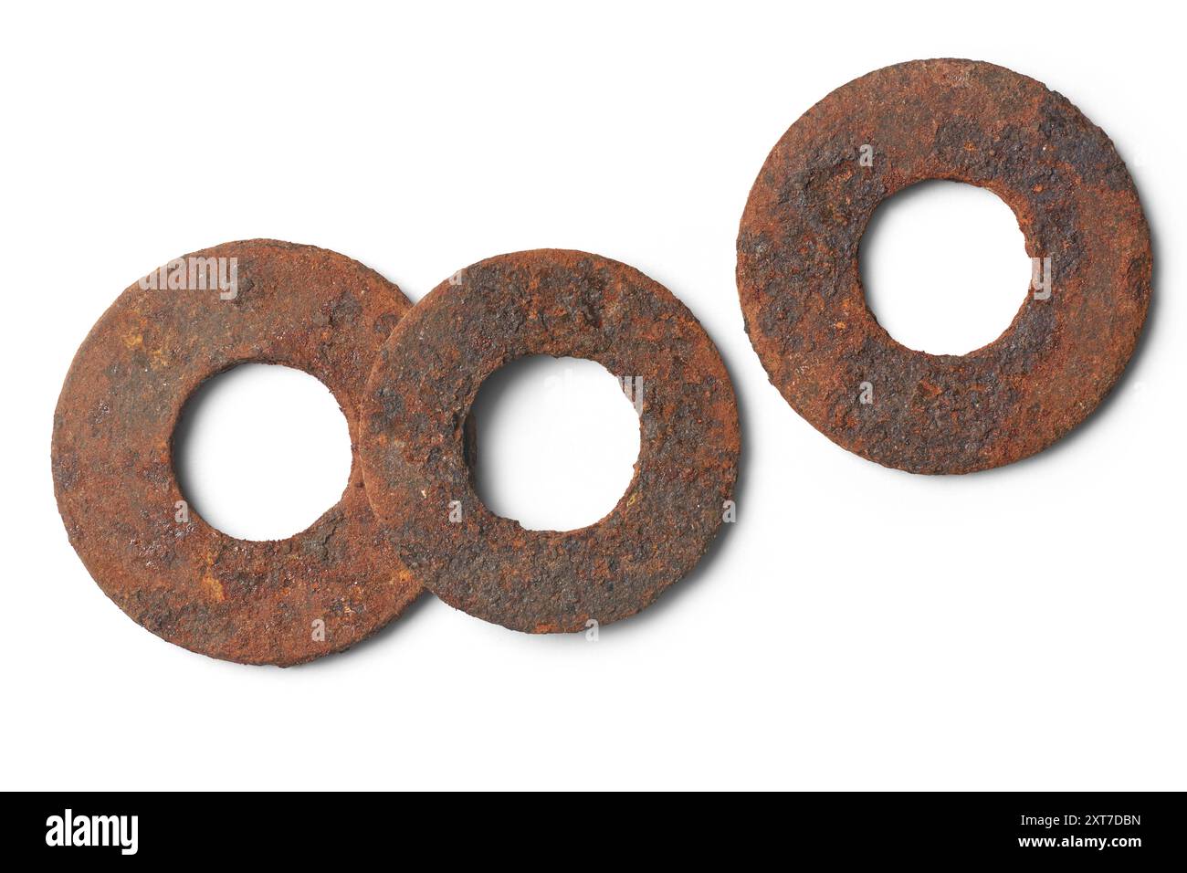 old corroded flat metal washers isolated white background, circular ...