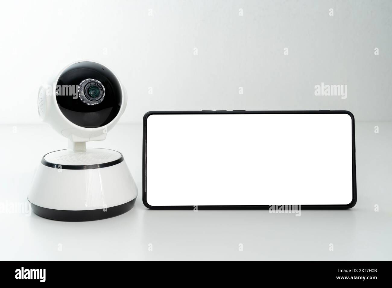 Smart home security camera. Webcam white background. Copy space ...