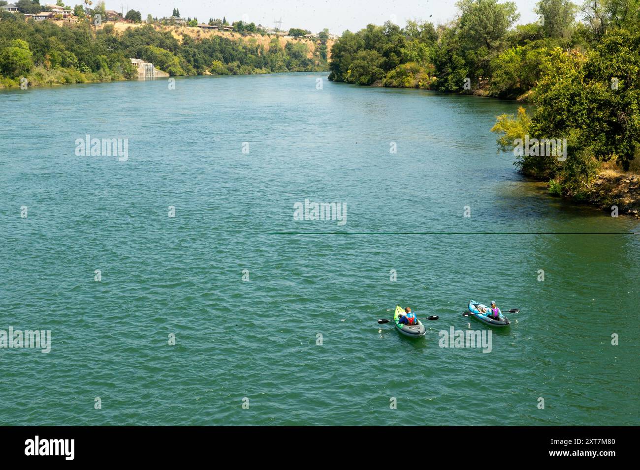 Redding, Ca, USA. 25th July, 2024. People float down the Sacramento ...