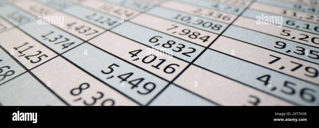Investigation papers with columns of digits on table Stock Photo - Alamy