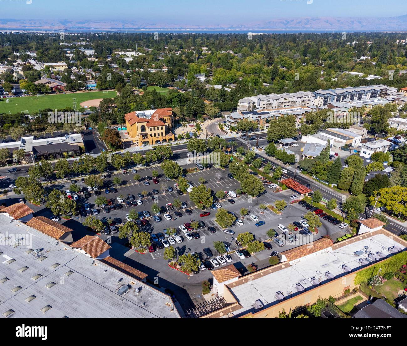 Aerial view of shopping center with parking lot at intersection of El ...