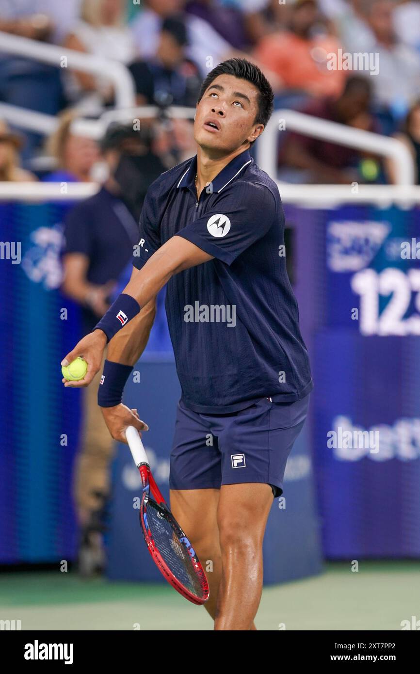 Mason, Ohio-AUG 14, 2024.Brandon Nakashima serves during mens singles ...