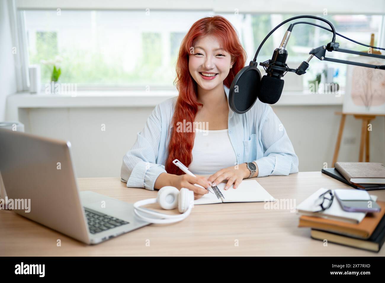 Asian dj working at radio station hi-res stock photography and images ...
