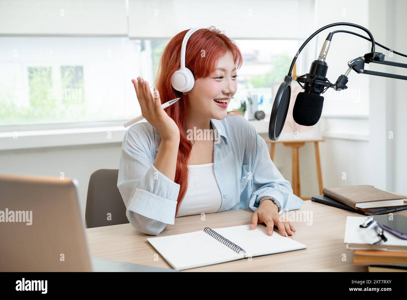 Asian dj working at radio station hi-res stock photography and images ...