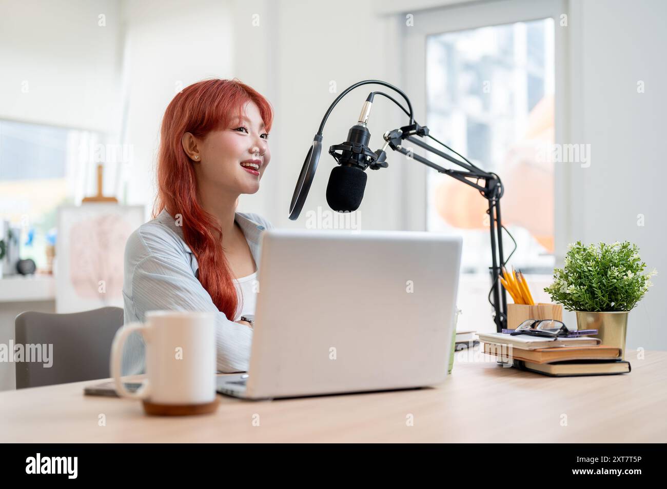 Asian dj working at radio station hi-res stock photography and images ...