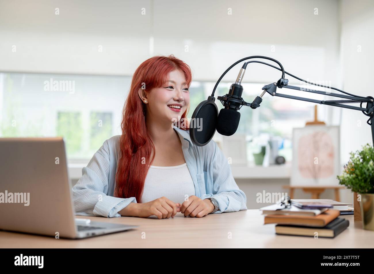 Asian dj working at radio station hi-res stock photography and images ...