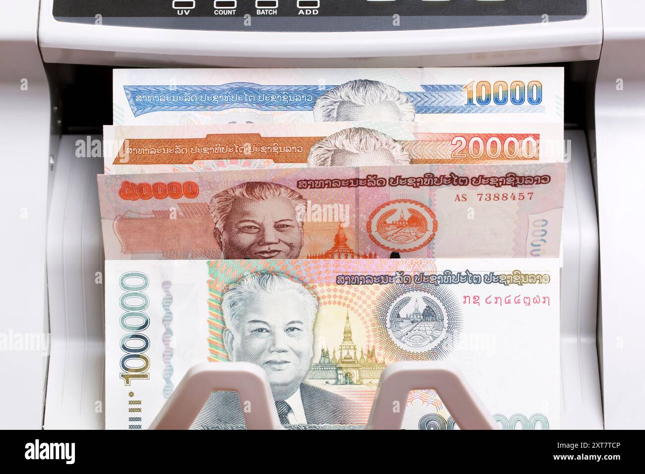 Lao money - kip in the counting machine Stock Photo - Alamy