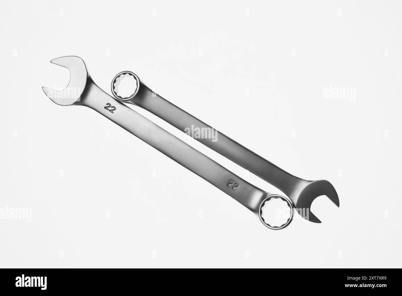 Two ratcheting wrenches on white background, top view. Auto mechanic ...