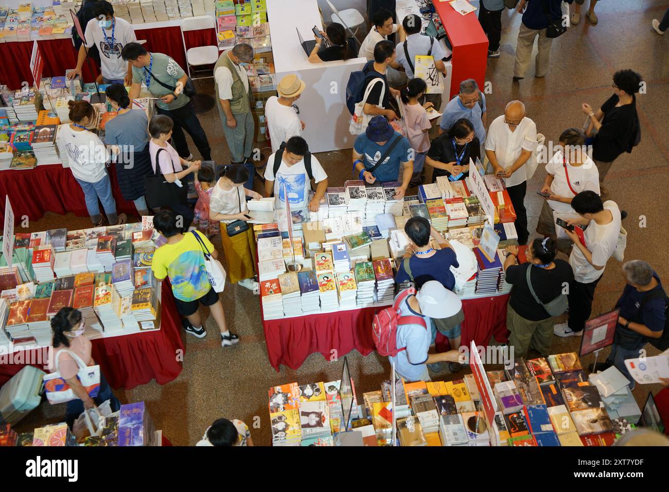 SHANGHAI, CHINA - AUGUST 14, 2024 - Readers select and buy books at the ...
