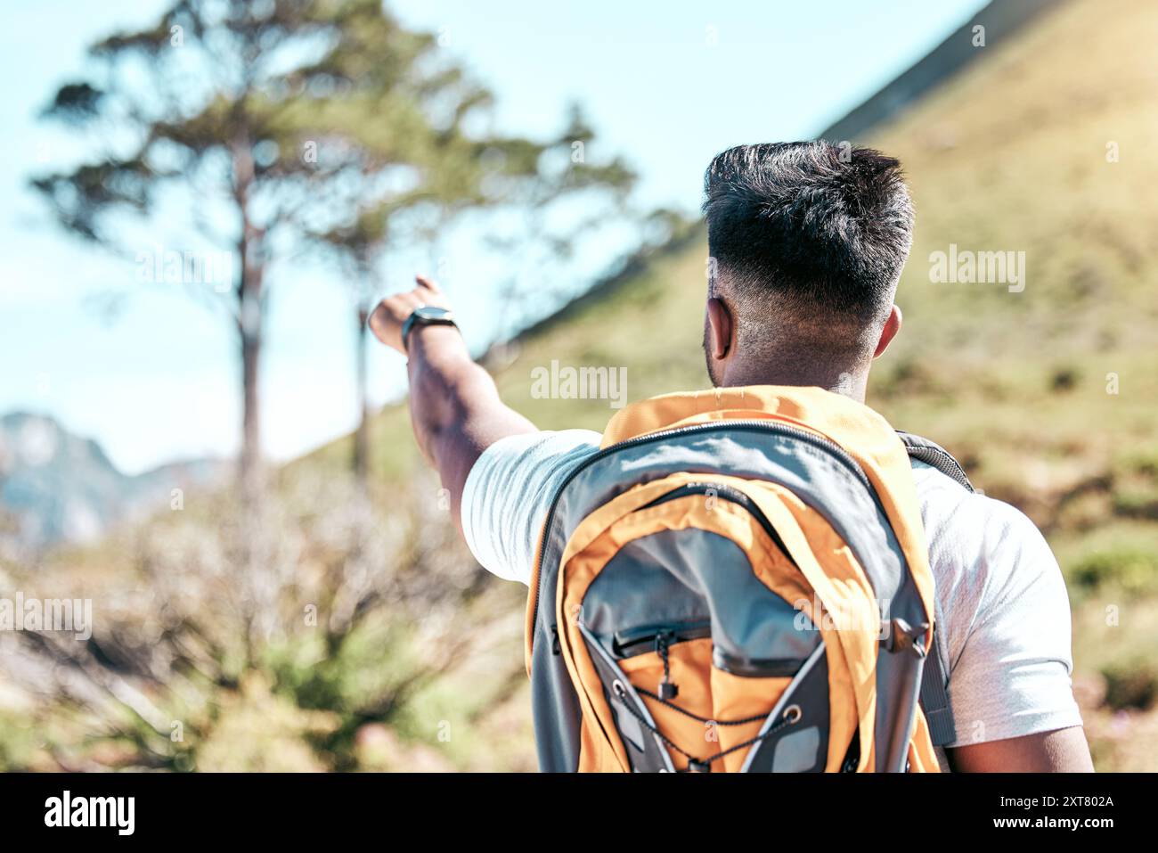 Destination, hiker and man pointing at mountain peak with nature ...