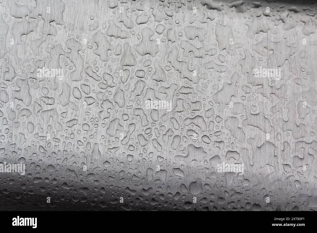 Raindrops on a metal surface close-up. Backgrounds Stock Photo - Alamy