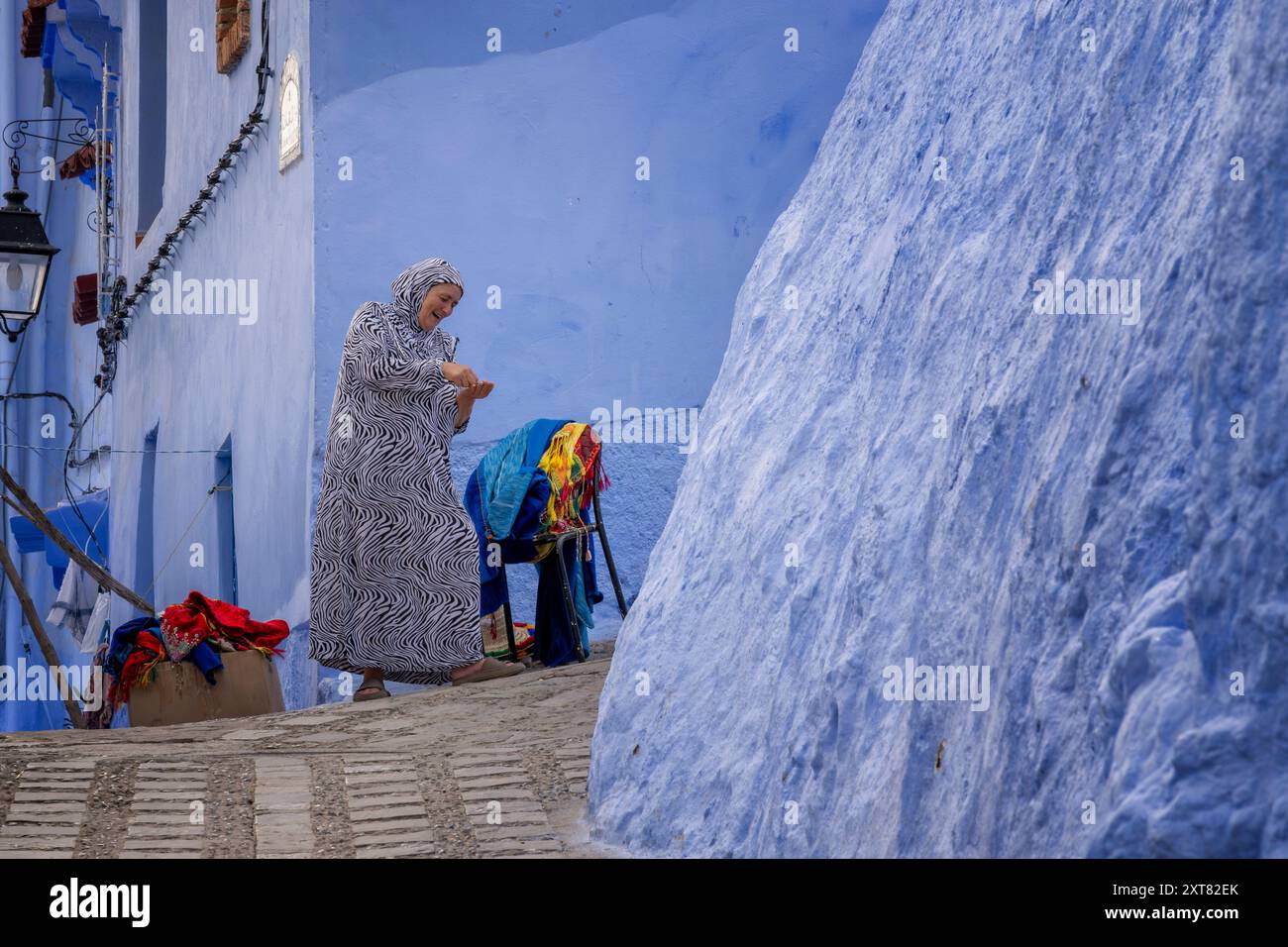 Chefchaouen, Morocco Moroccan woman with a beautiful traditional dress ...
