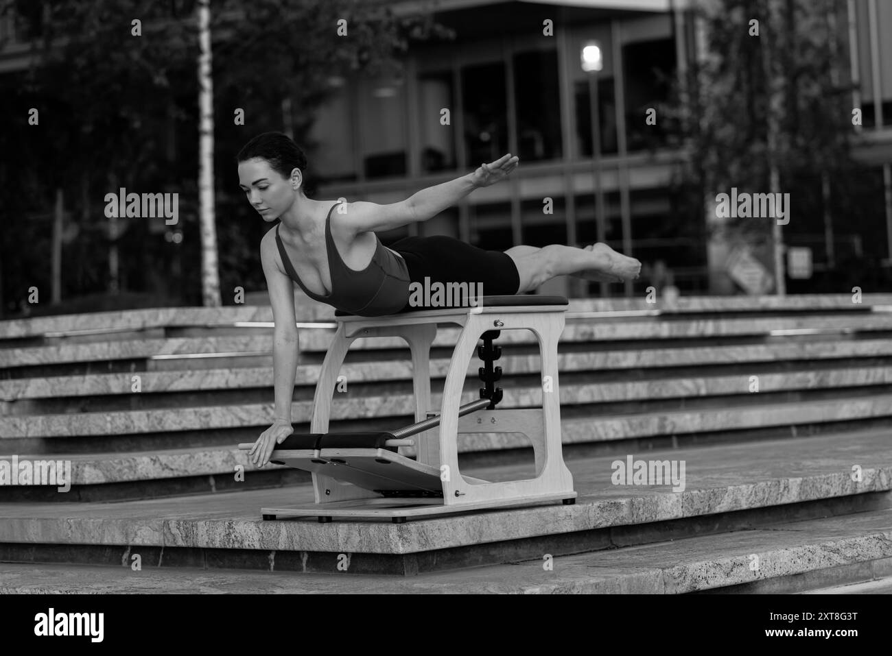 Pilates reformer chair woman fitness yoga gym exercise. Correction of ...