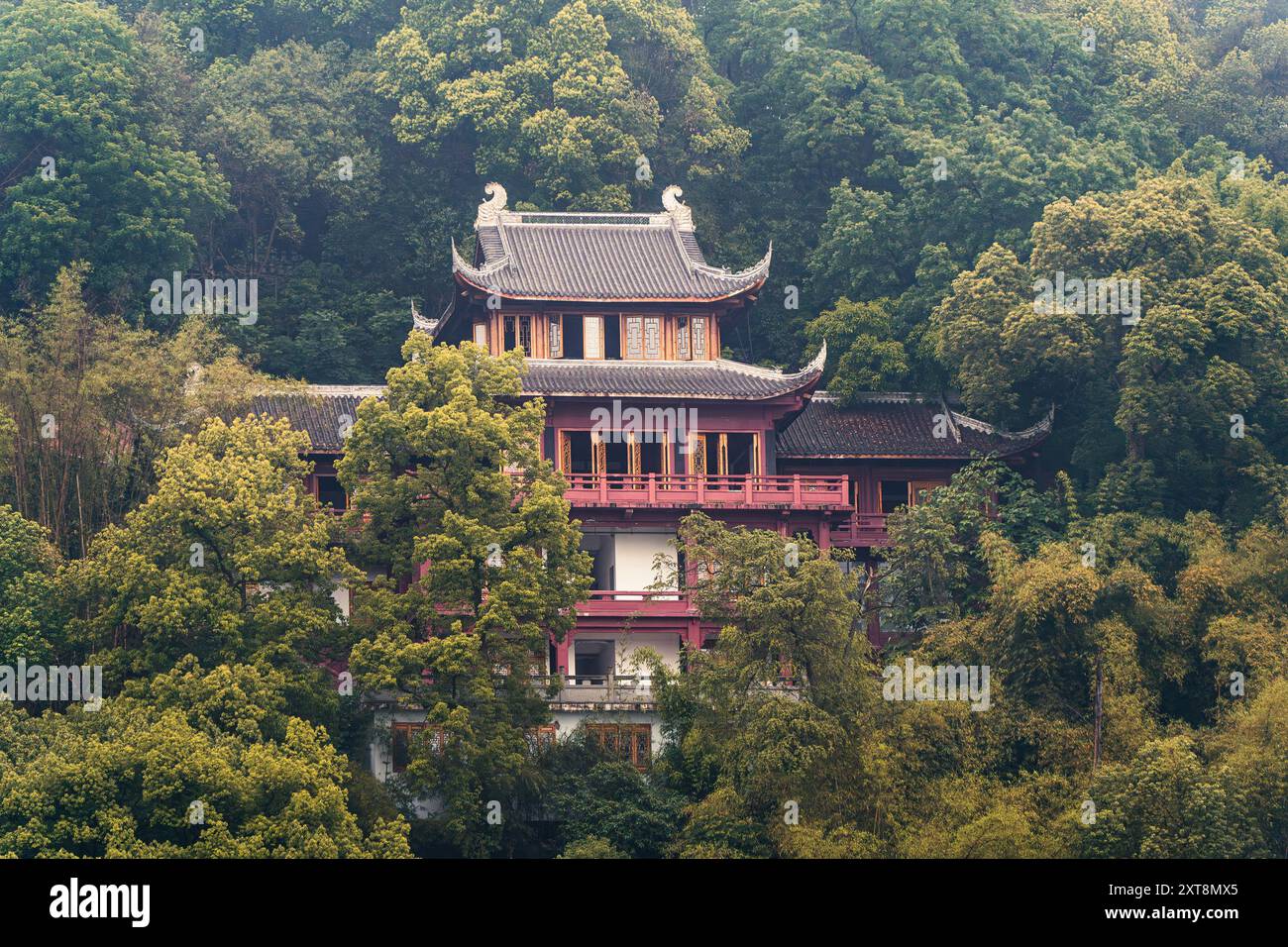 Ancient Chinese temple on top of the cliff near the Leshan Giant Buddha ...