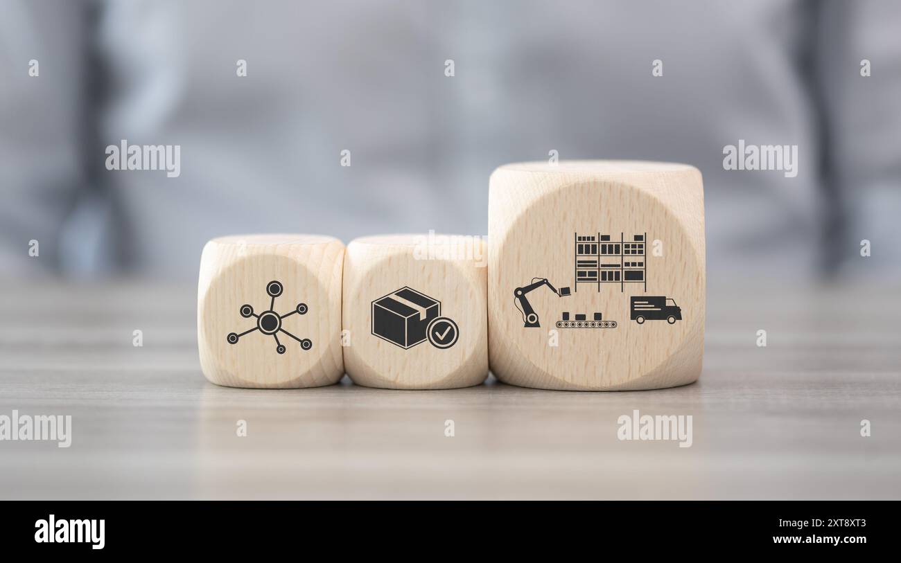 Wooden blocks with symbol of logistics concept Stock Photo - Alamy
