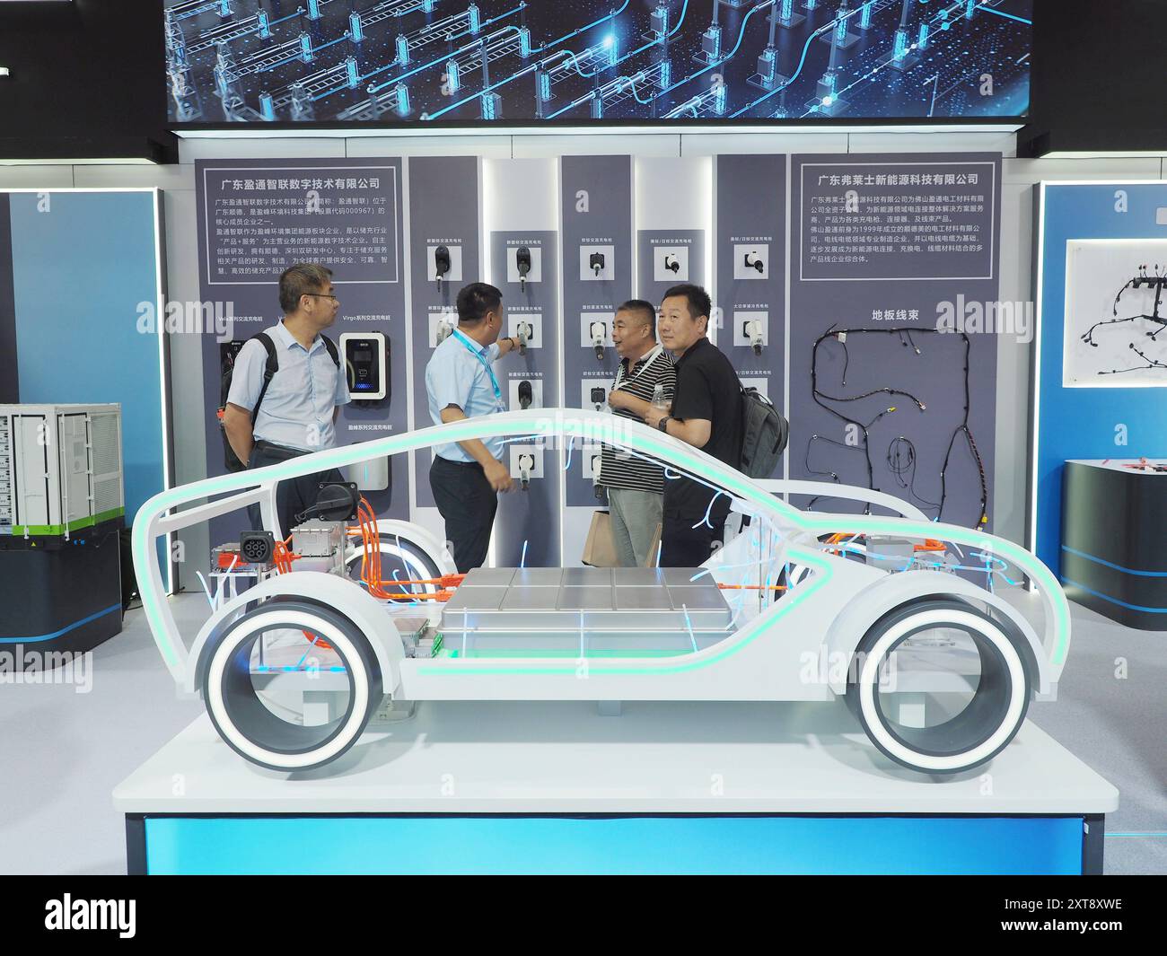 BEIJING, CHINA - AUGUST 14, 2024 - Visitors view a model of a new ...
