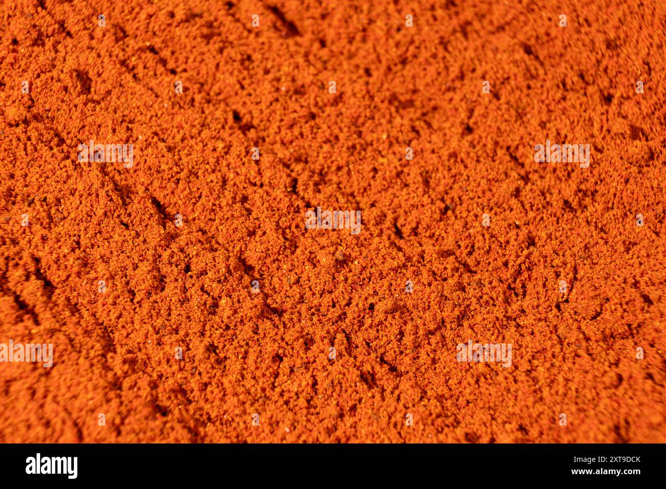 Ground paprika, red terracotta spice background, art in cooking Stock ...