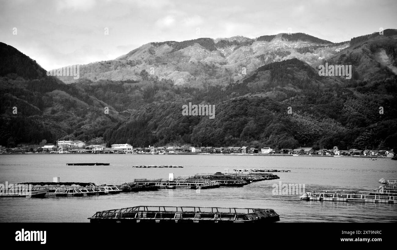Black and white image of countryside and traditional wooden fishermen ...