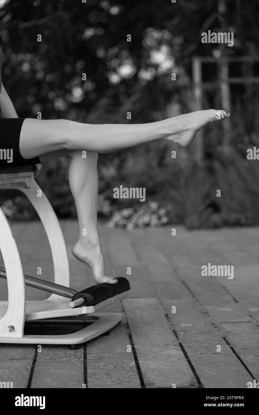 Pilates reformer chair woman fitness yoga gym exercise. Correction of ...