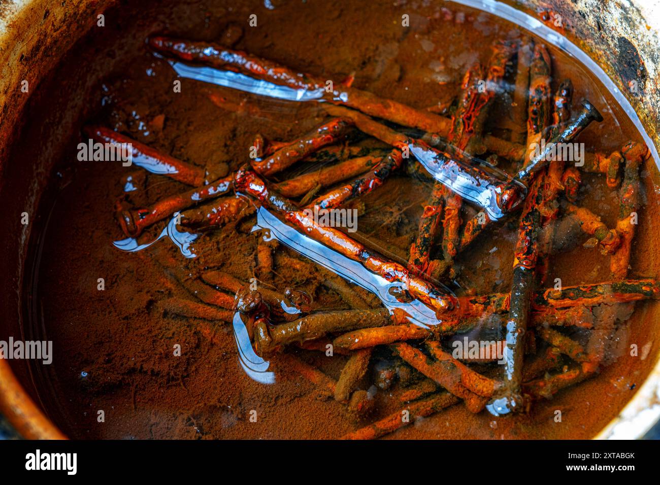 old rusty nails in the water Stock Photo - Alamy