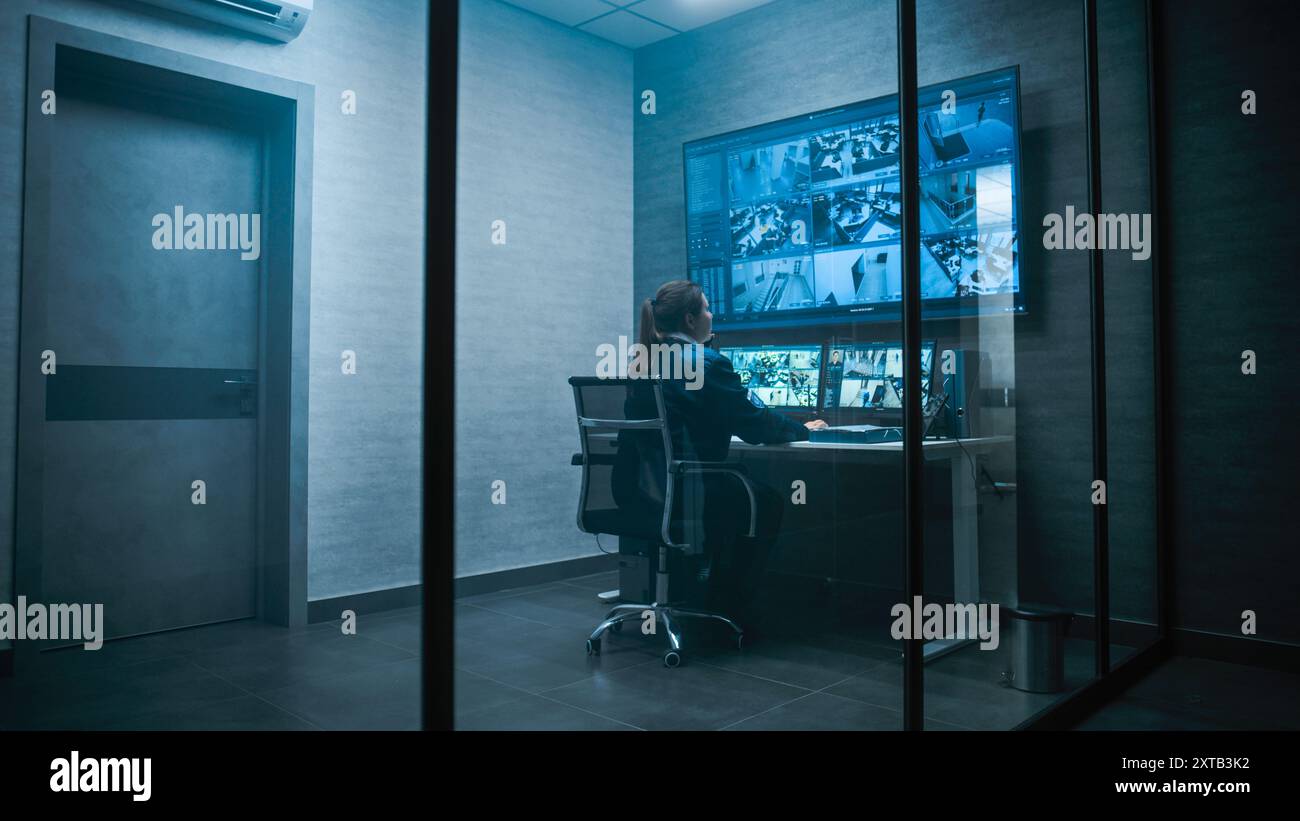 Female security worker have discussion with colleague in monitoring ...