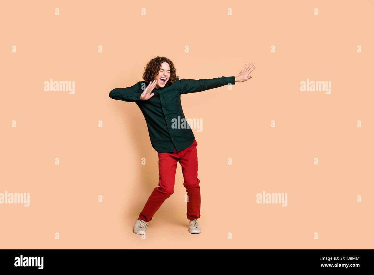 Photo portrait of handsome young guy dancing have fun disco dressed ...